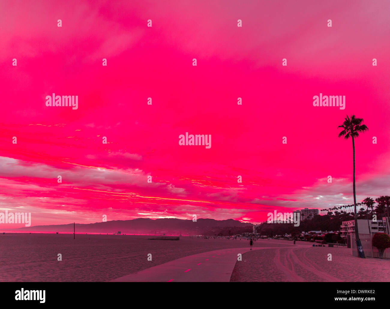 A spectacular red sunset at the beach in Santa Monica California ...
