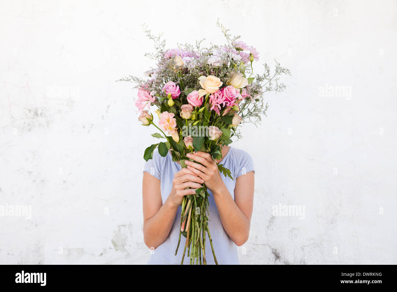 Hiding behind flowers hi-res stock photography and images - Alamy