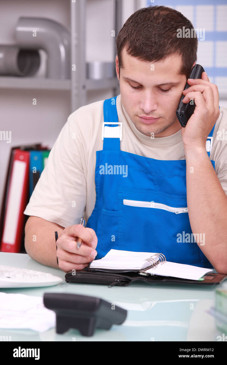 Warehouse worker placing order Stock Photo - Alamy