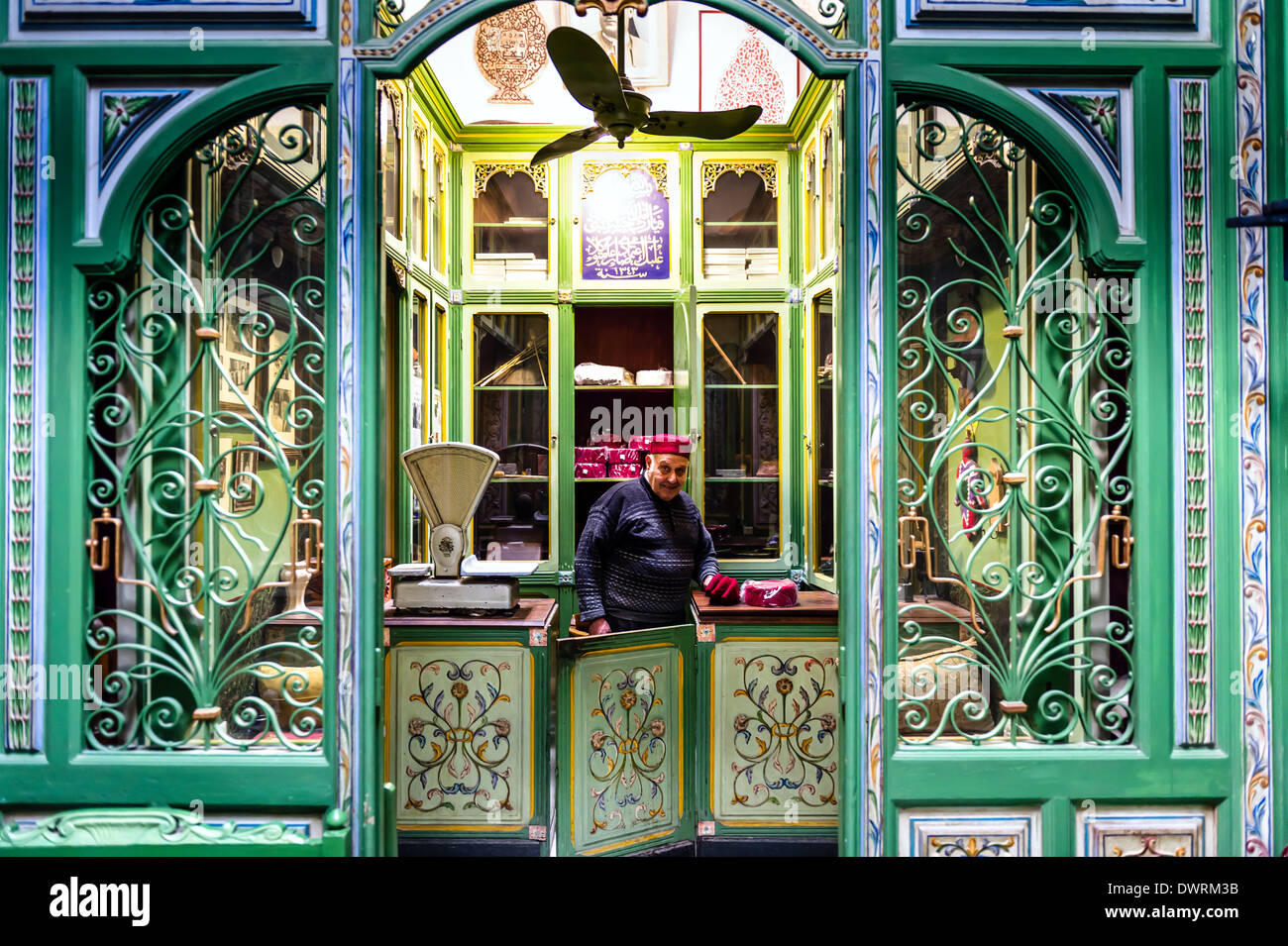 North Africa, Tunisia, Tunis. Merchant fez in his very old shop in a ...