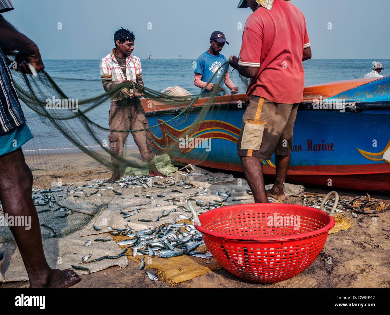 Fishermen drying nets hi-res stock photography and images - Alamy