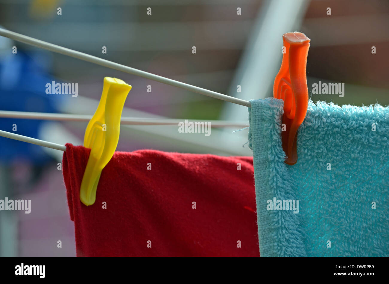 Good drying day for the washing, well used clothes pegs Stock Photo - Alamy