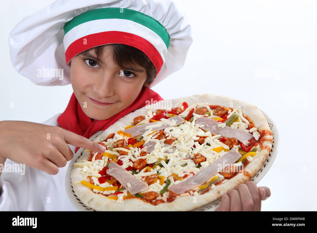 Kid dressed as pizza chef Stock Photo - Alamy