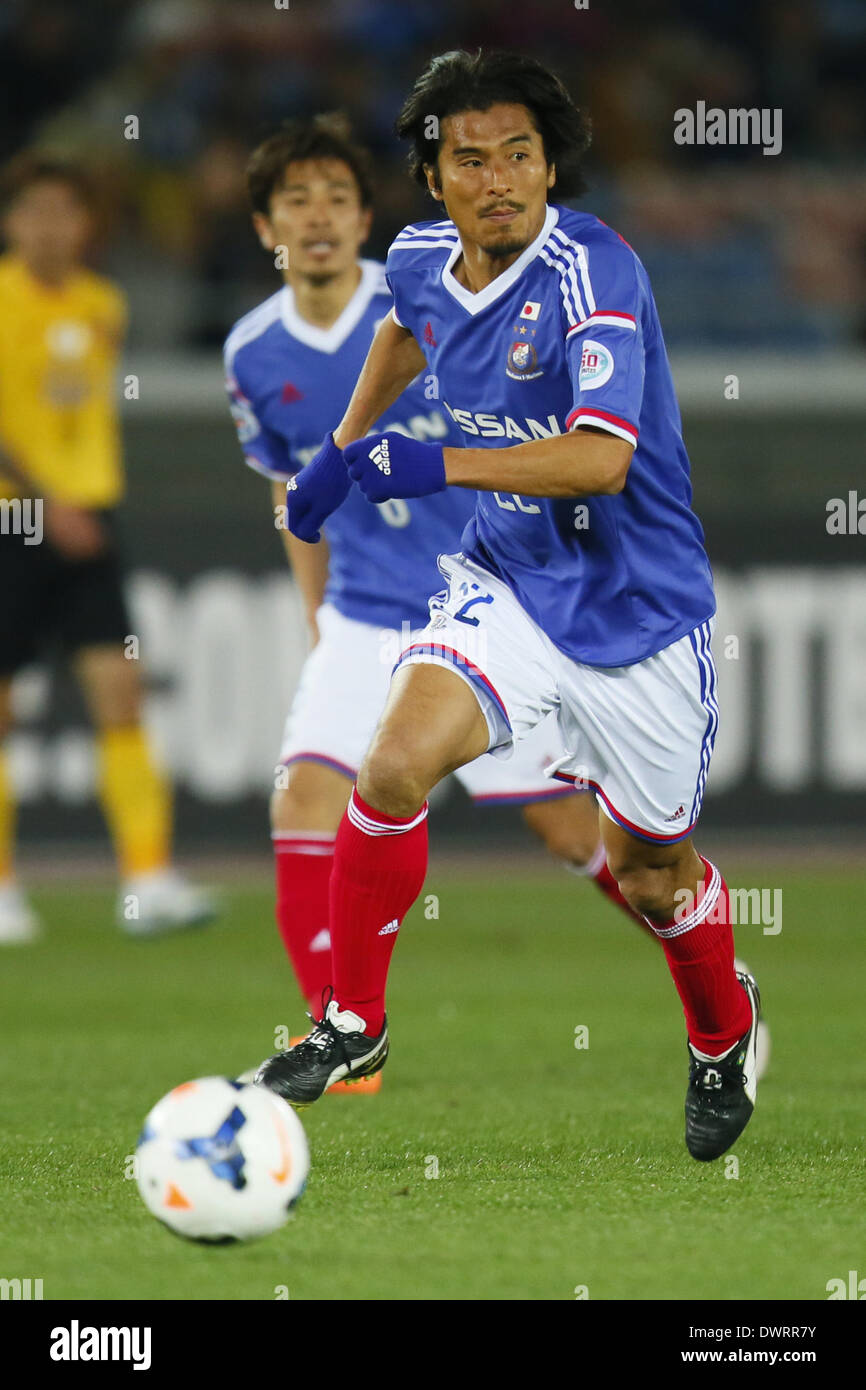 Nissan Stadium, Kanagawa, Japan. 12th Mar, 2014. Yuji Nakazawa (F ...