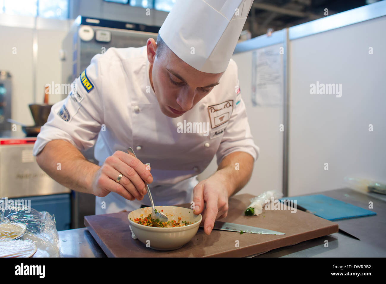 Budapest, Hungary. 12th Mar, 2014. Hungarian chef Gabor Molnar prepares ...