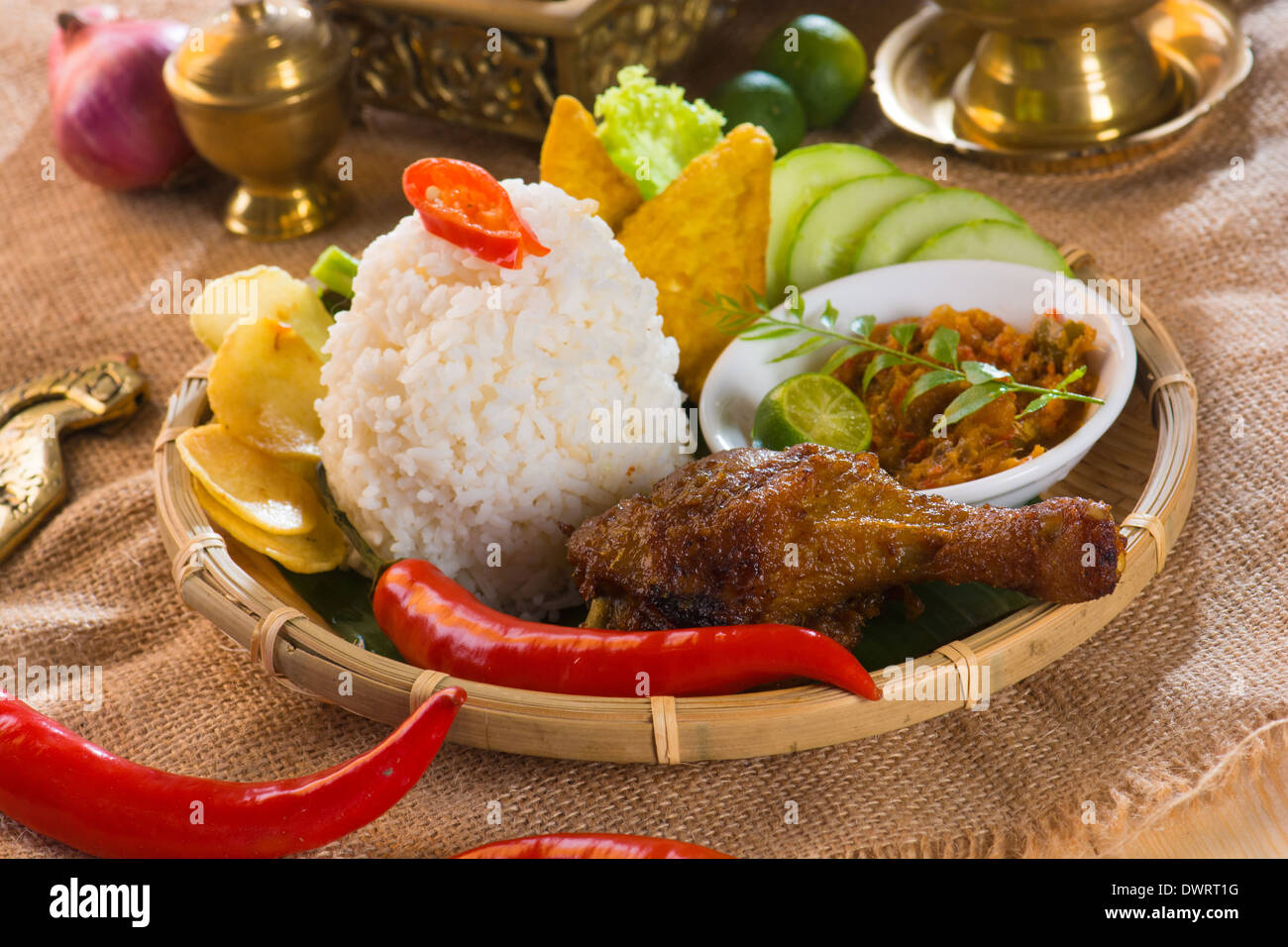 fried chicken rice with traditional setting Stock Photo - Alamy