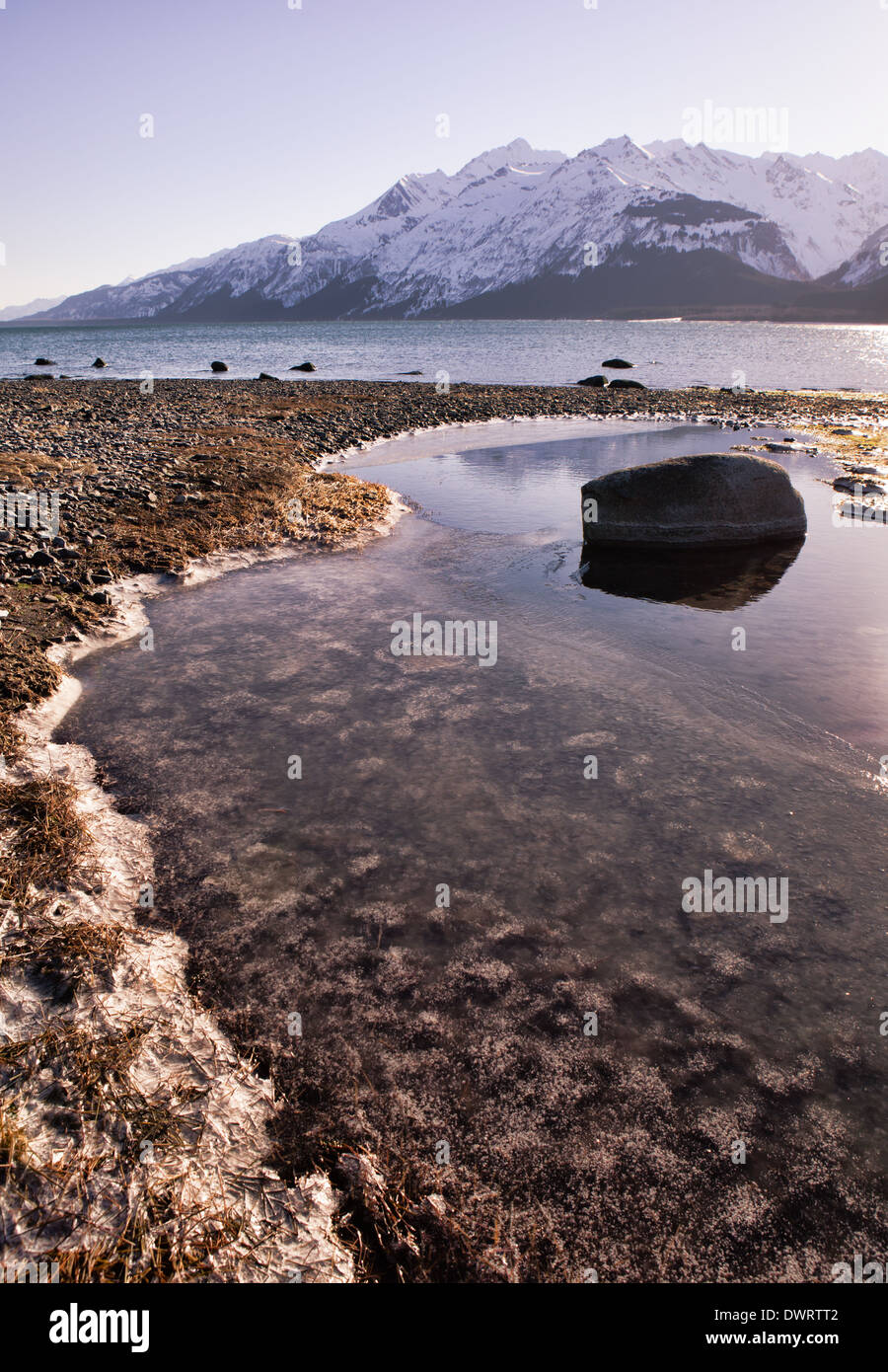 Frost and freezing pools on a winter beach in Southeast Alaska on a ...