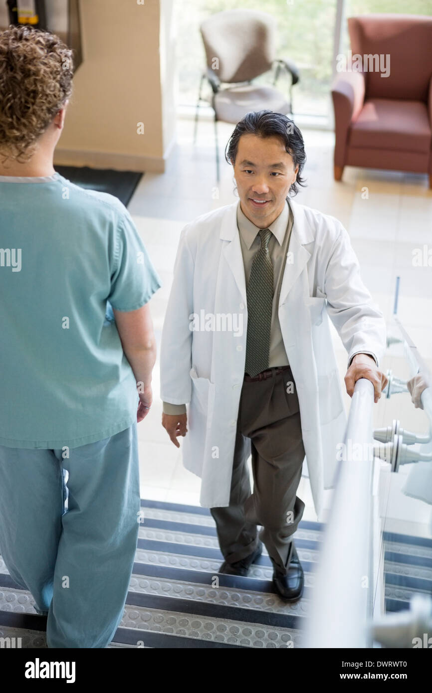 Nurse walking down steps hi-res stock photography and images - Alamy