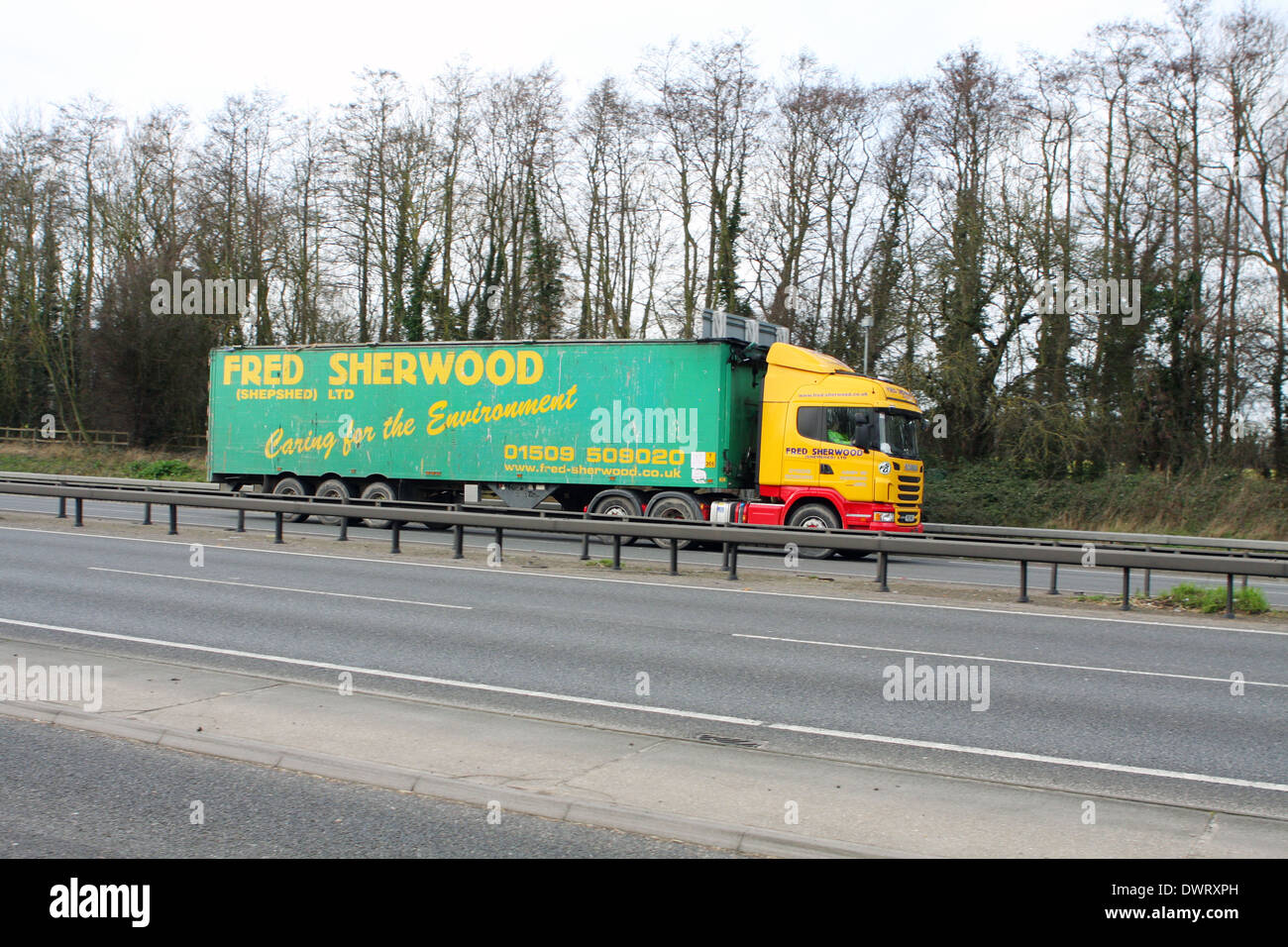An articulated truck traveling along the A12 road in Essex, England ...