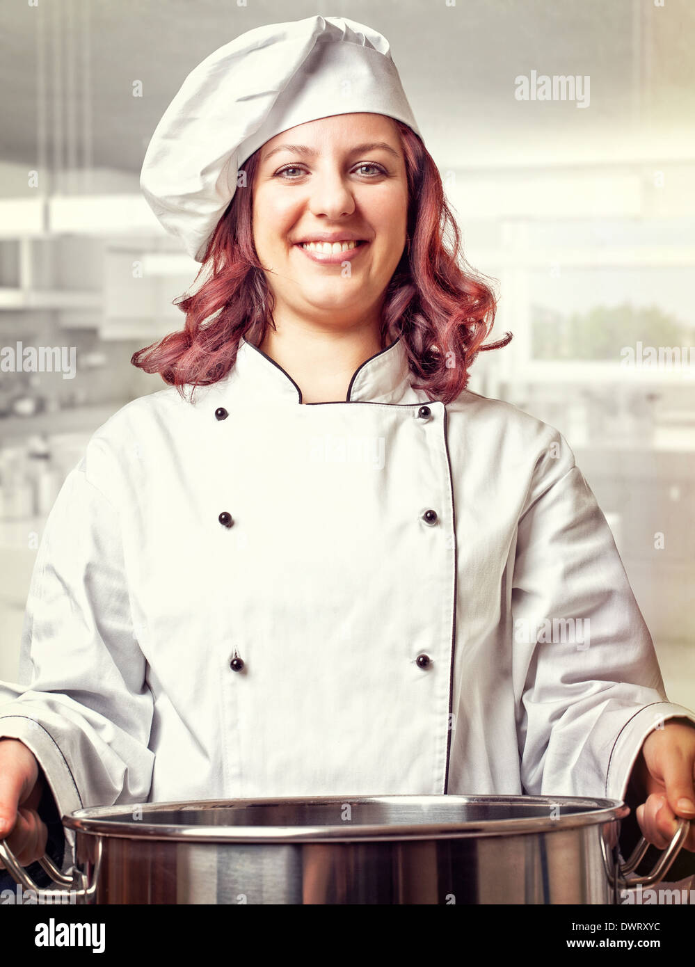 smiling young woman chef portrait Stock Photo - Alamy
