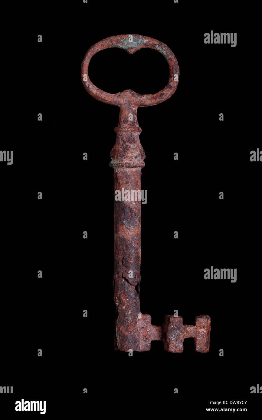 18th century antique key isolated on black Stock Photo - Alamy