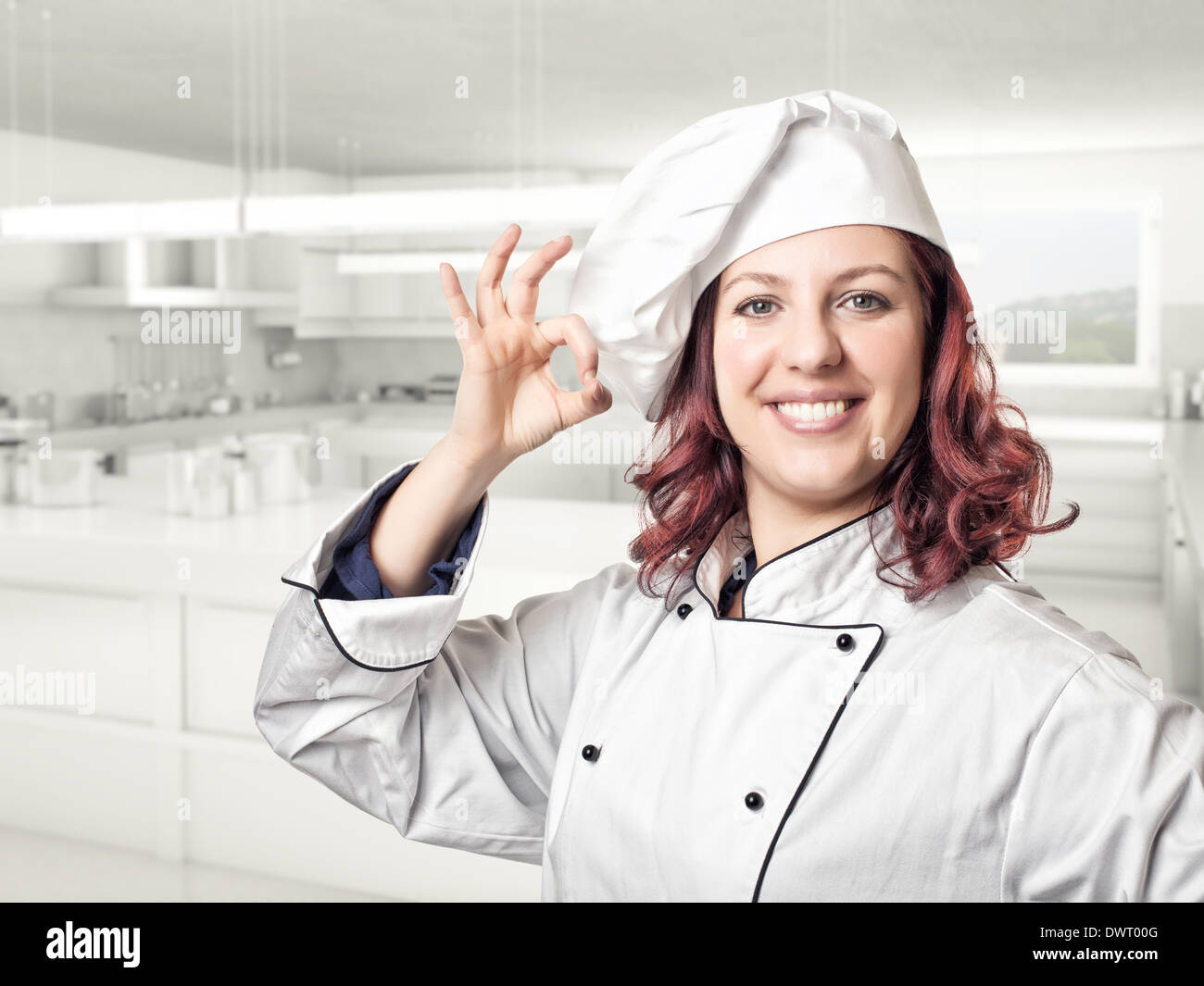 smiling young woman chef portrait Stock Photo - Alamy