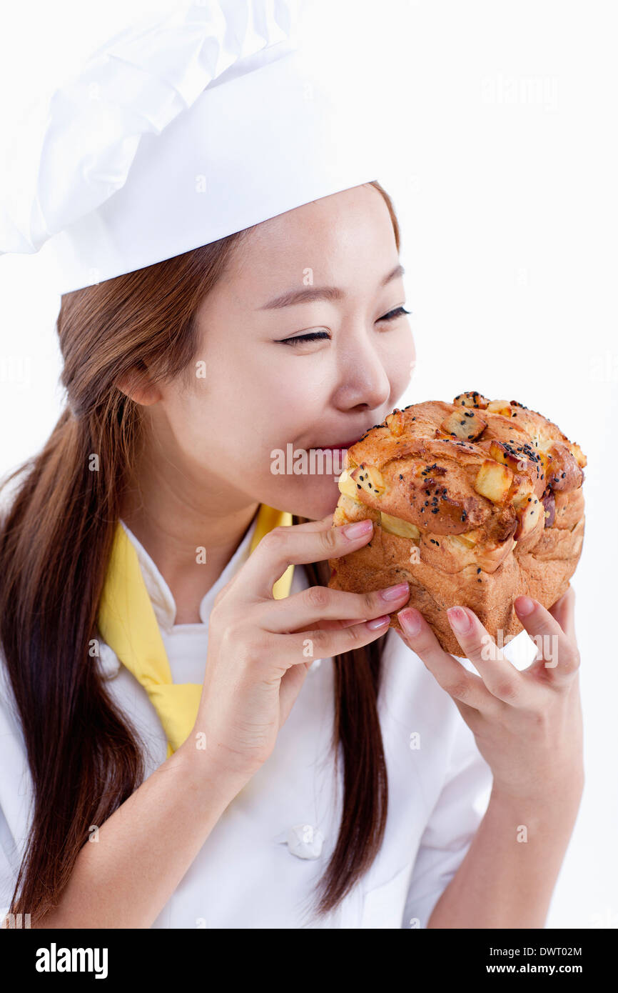 Asian female pastry chef holding hi-res stock photography and images ...