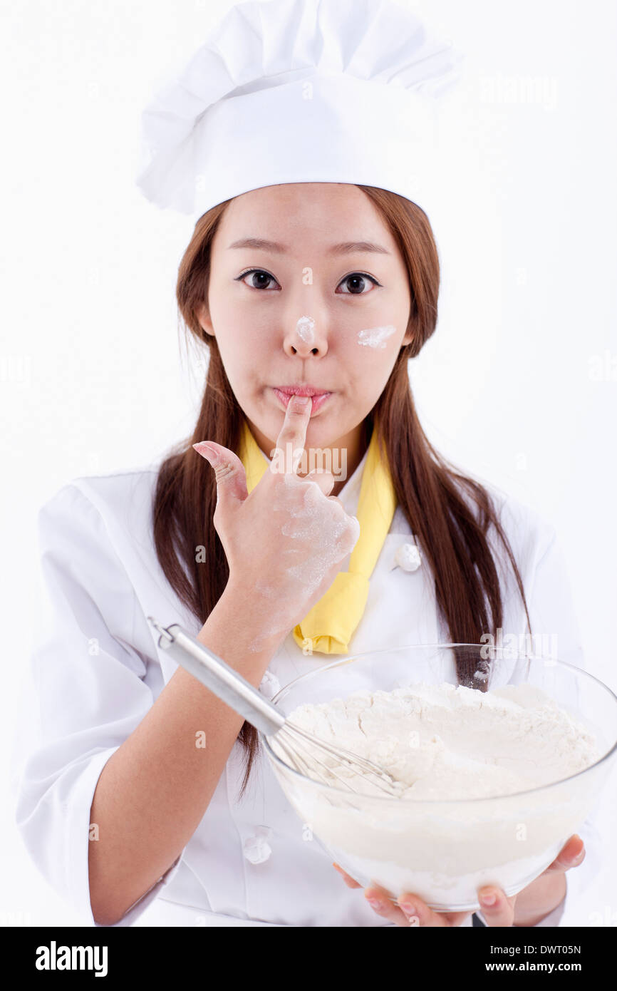 close up shot of a female pastry chef mixing the flour Stock Photo - Alamy