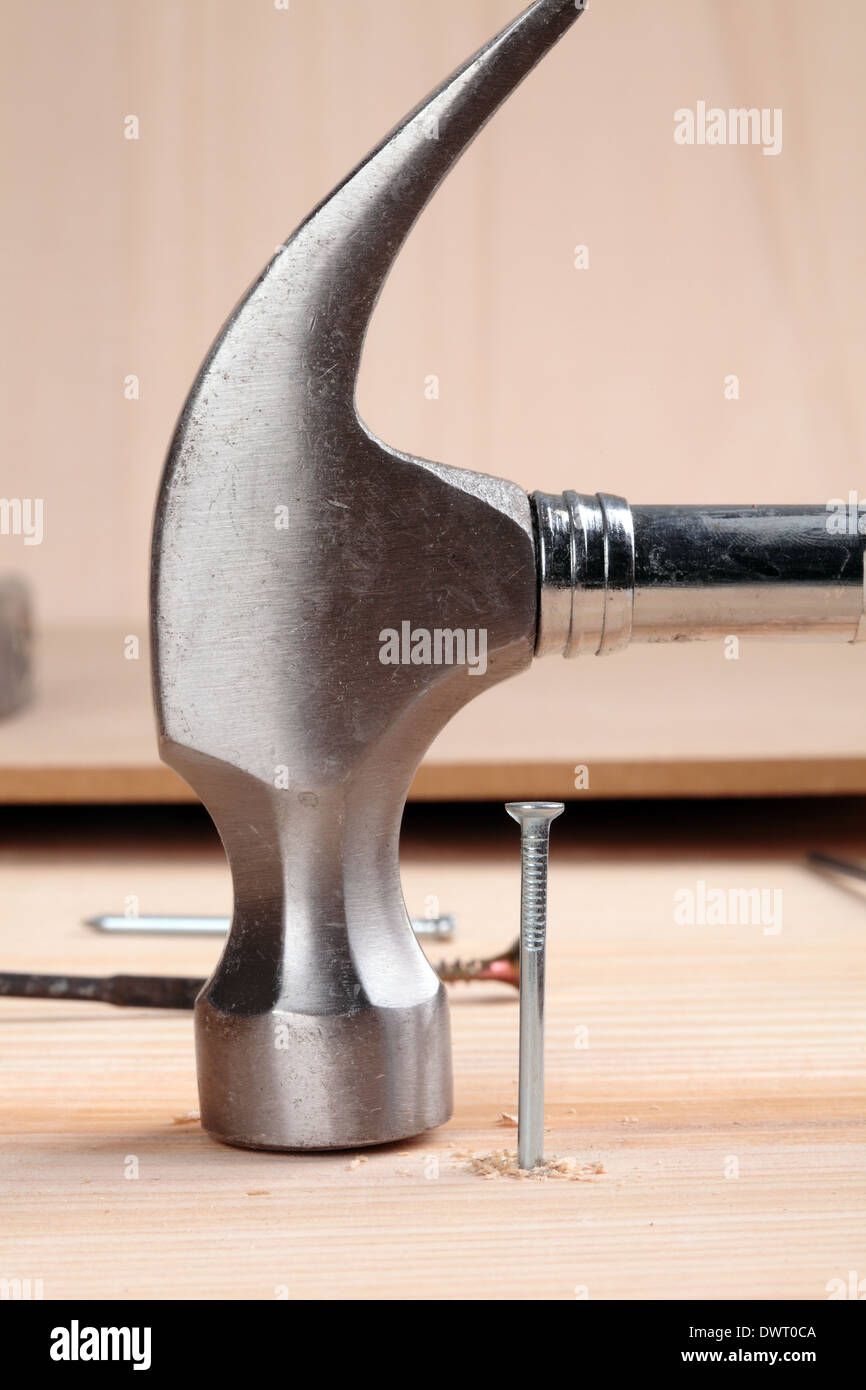 detail of a nail and a hammer Stock Photo - Alamy