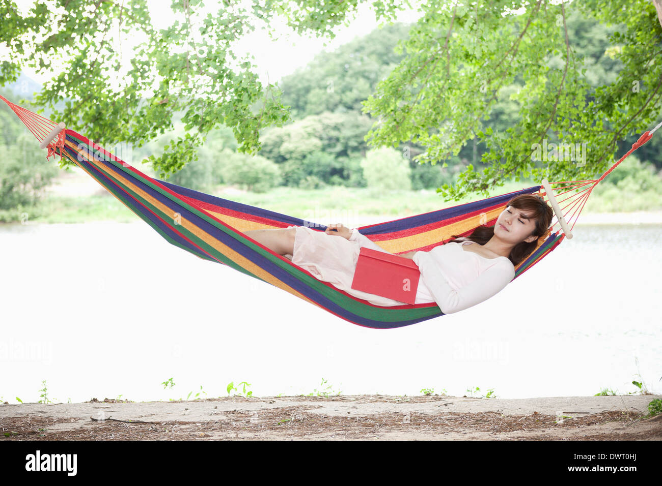Hammock woman book hi-res stock photography and images - Alamy