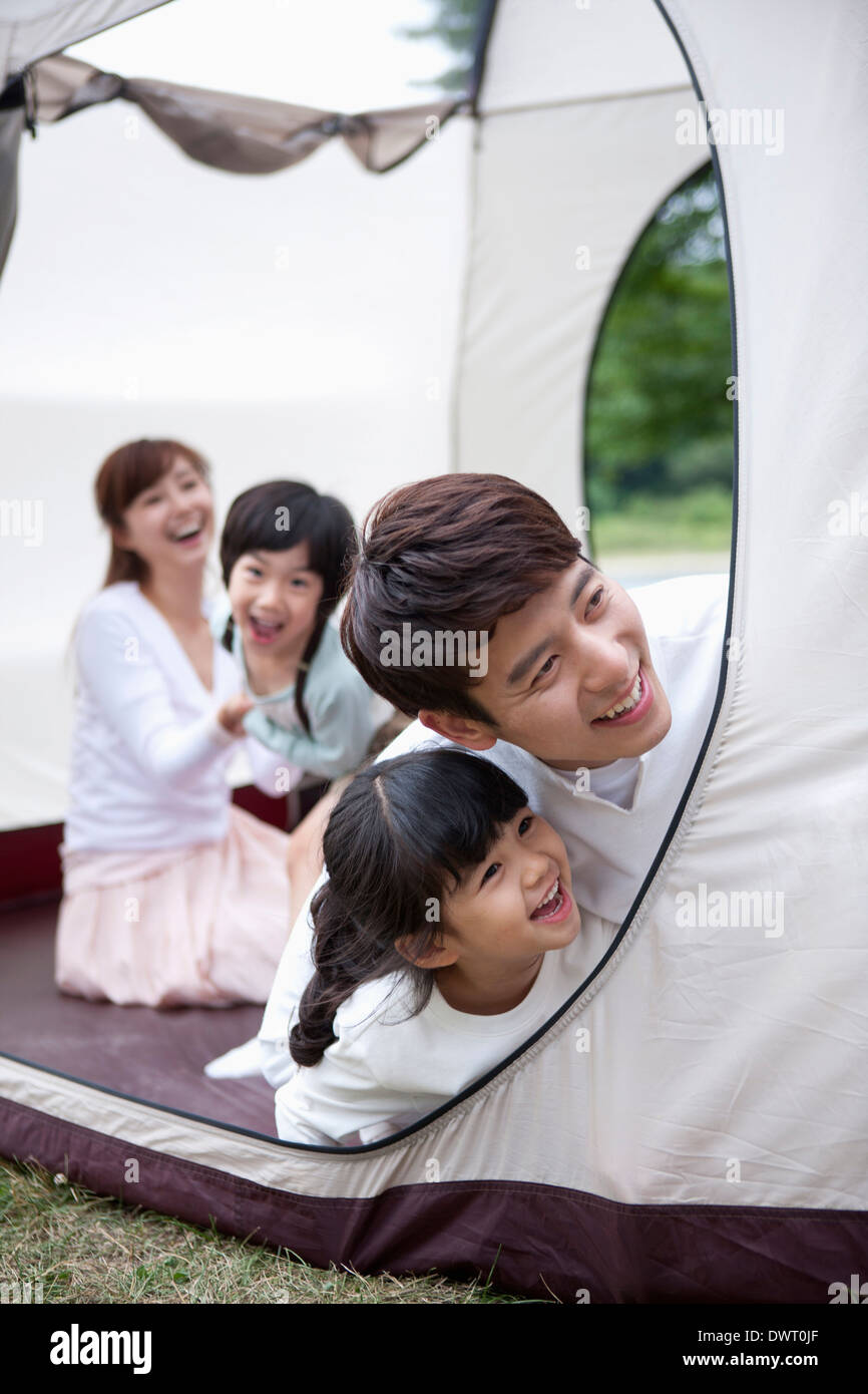 a family inside a camping tent Stock Photo - Alamy