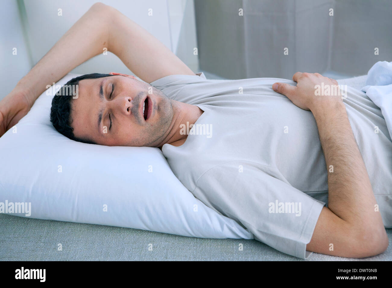 Snoring Man Stock Photos & Snoring Man Stock Images - Alamy