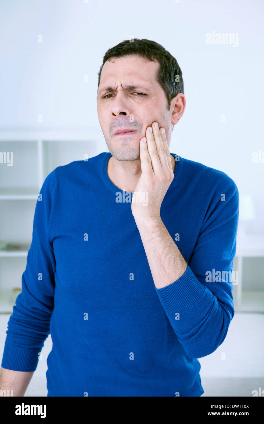 Man with toothache Stock Photo - Alamy