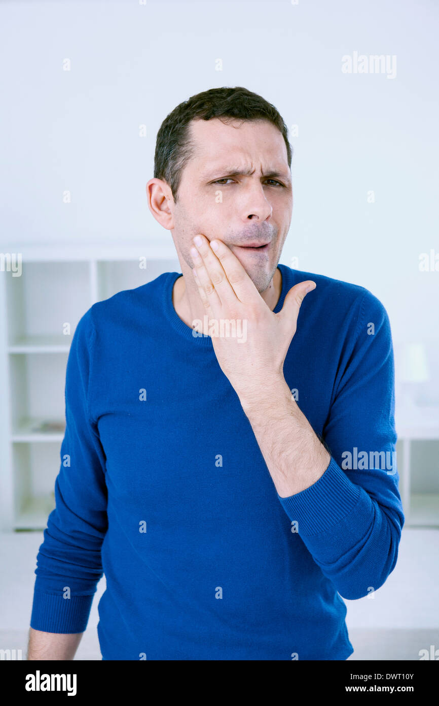 Man with toothache Stock Photo - Alamy