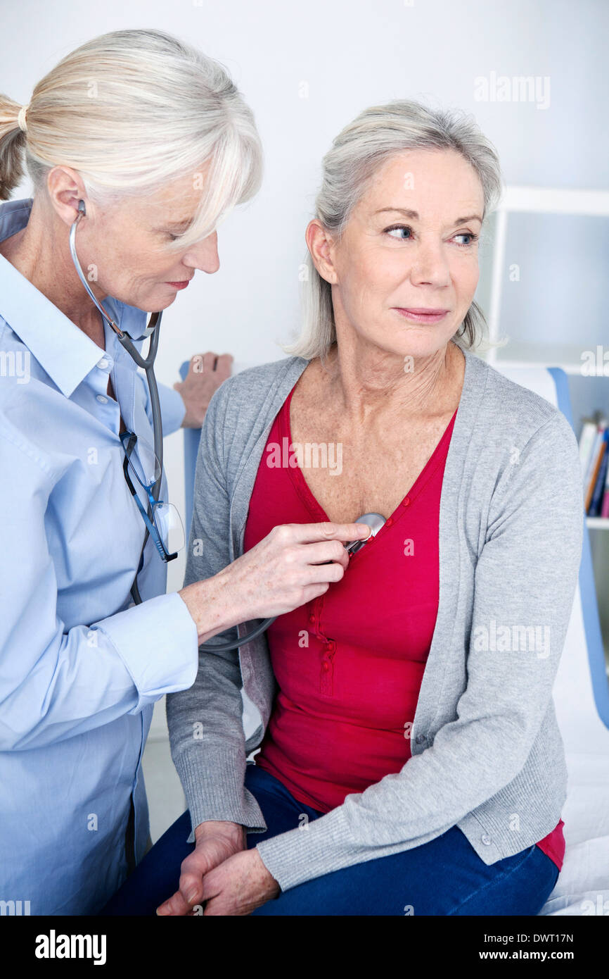 Female physical exam auscultation hi-res stock photography and images ...
