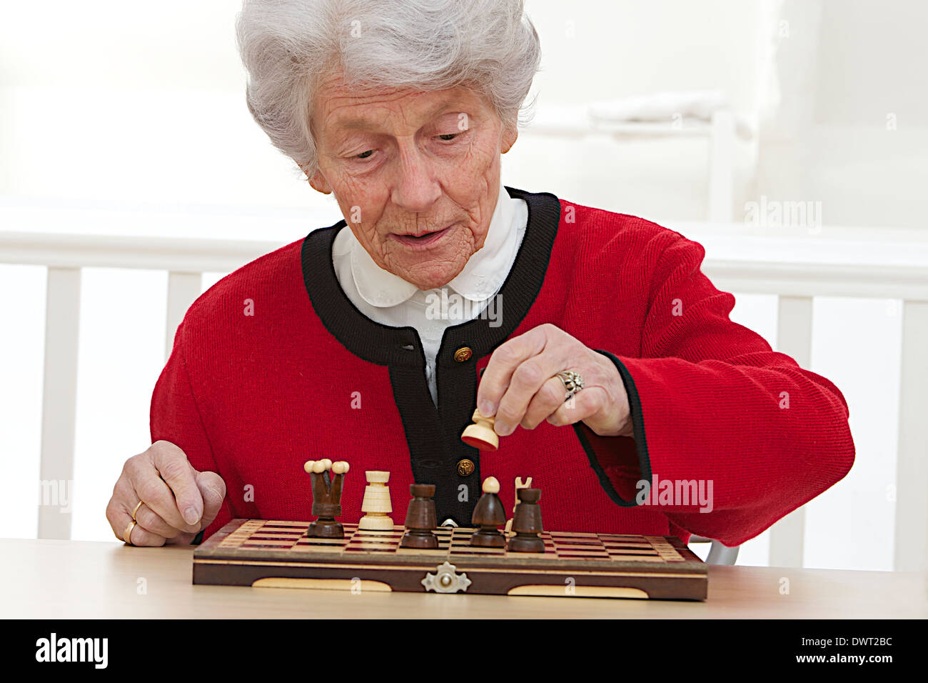 Elderly people playing chess Stock Photo - Alamy