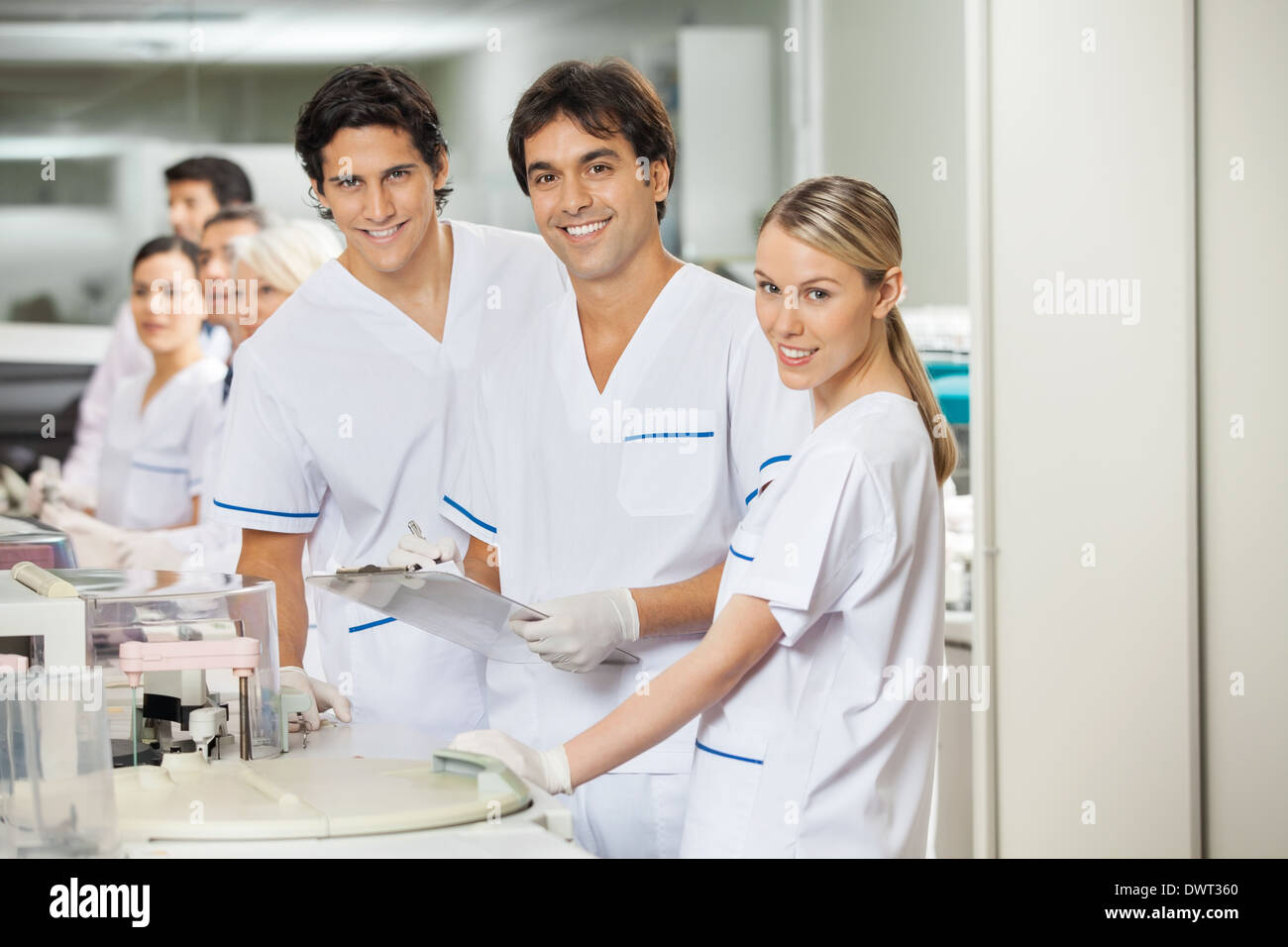 Team Of Researchers In Laboratory Stock Photo - Alamy