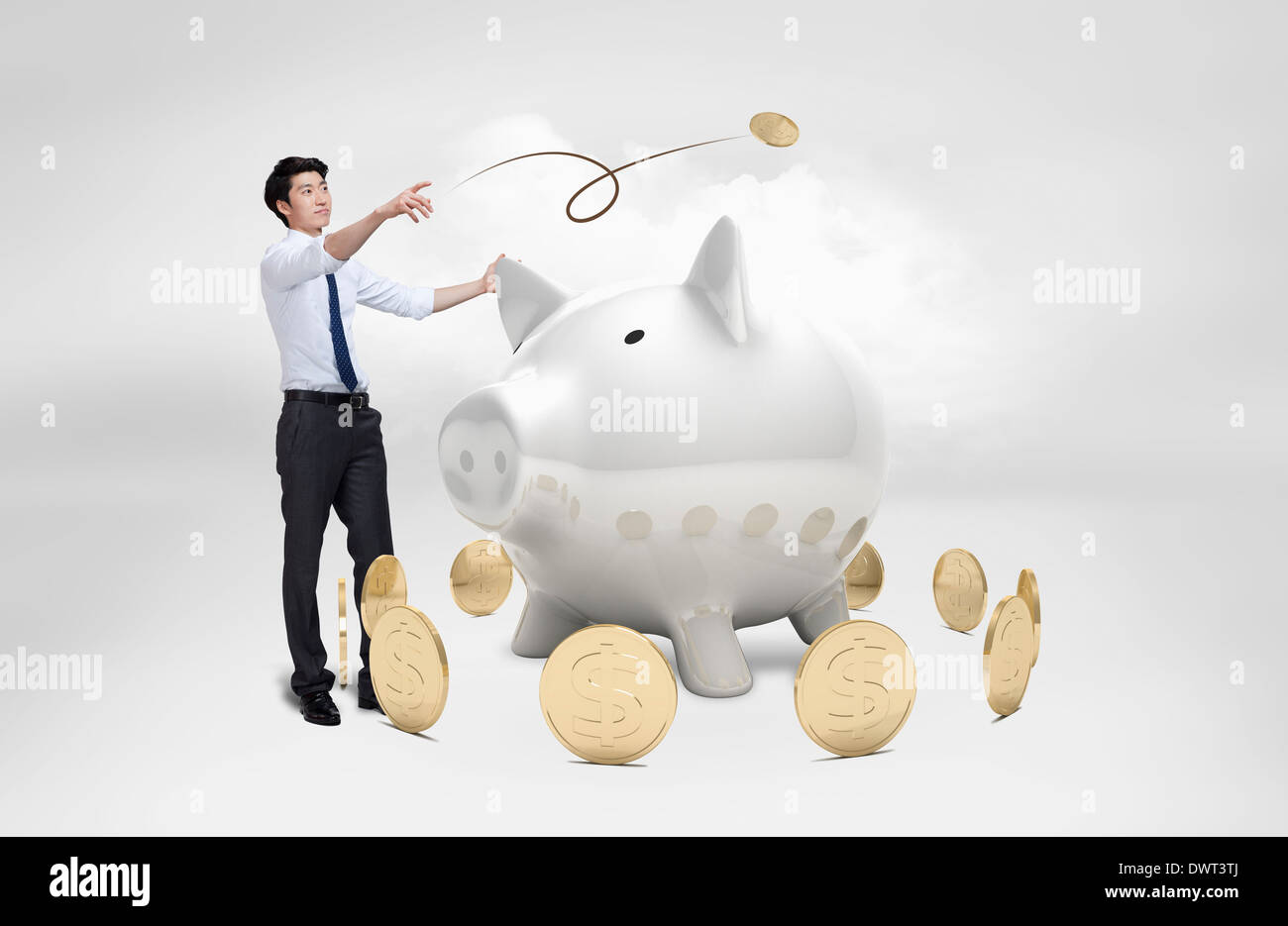 a business man throwing coins Stock Photo - Alamy