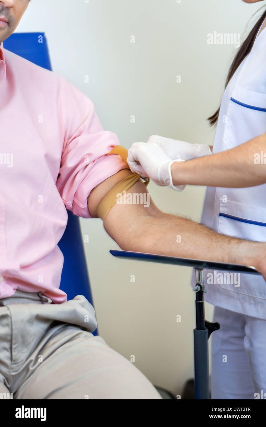 Nurse Preparing Patient For Blood Test Stock Photo - Alamy