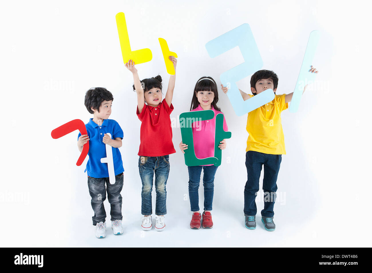 kids holding alphabet Stock Photo - Alamy