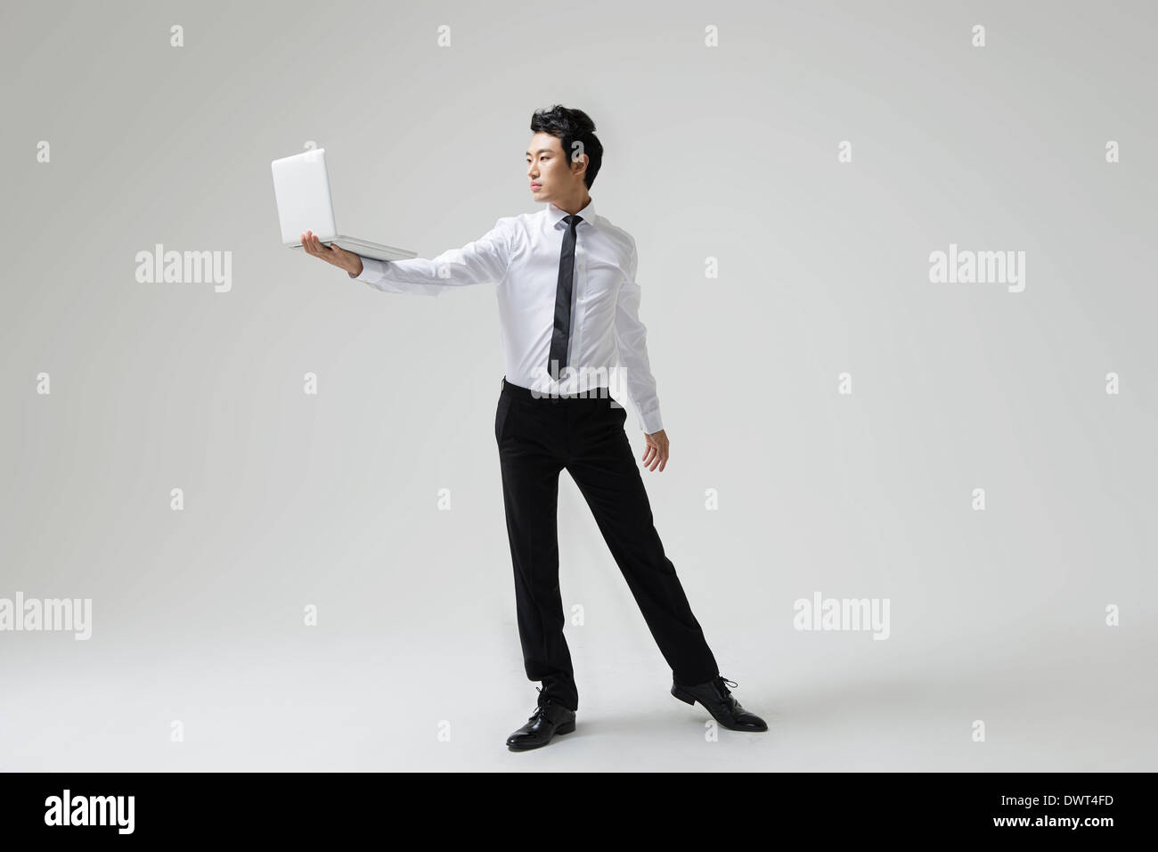 a business man making dance poses Stock Photo - Alamy