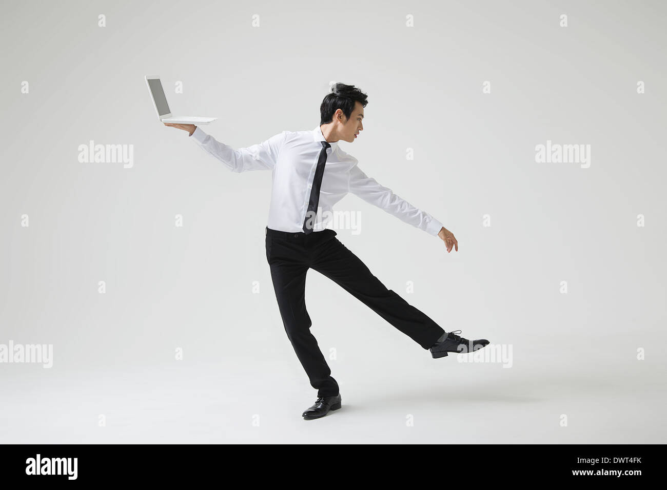 a business man making dance poses Stock Photo - Alamy