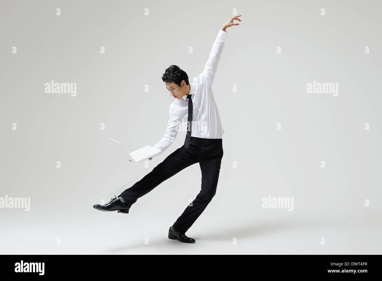a business man making dance poses Stock Photo - Alamy