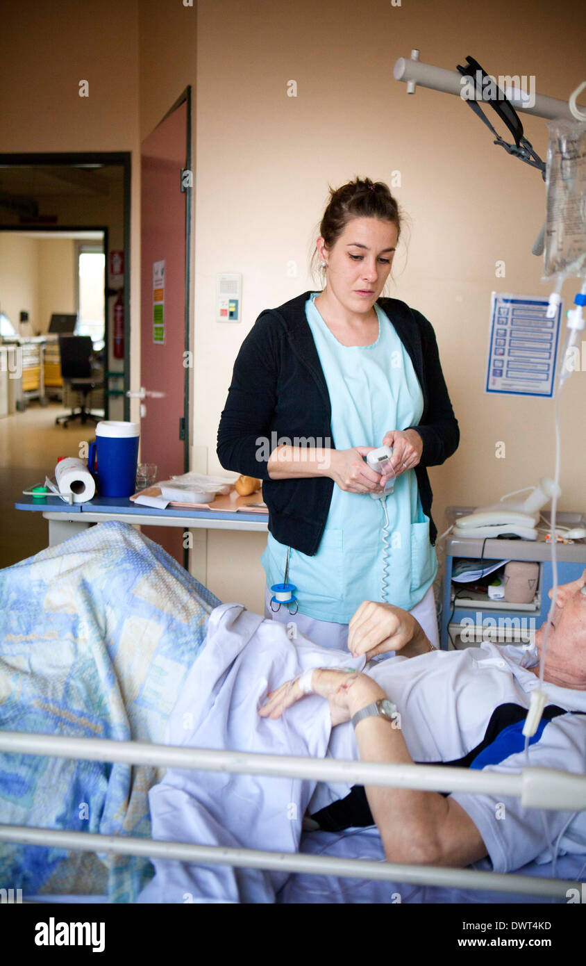 Nurse with patient Stock Photo - Alamy