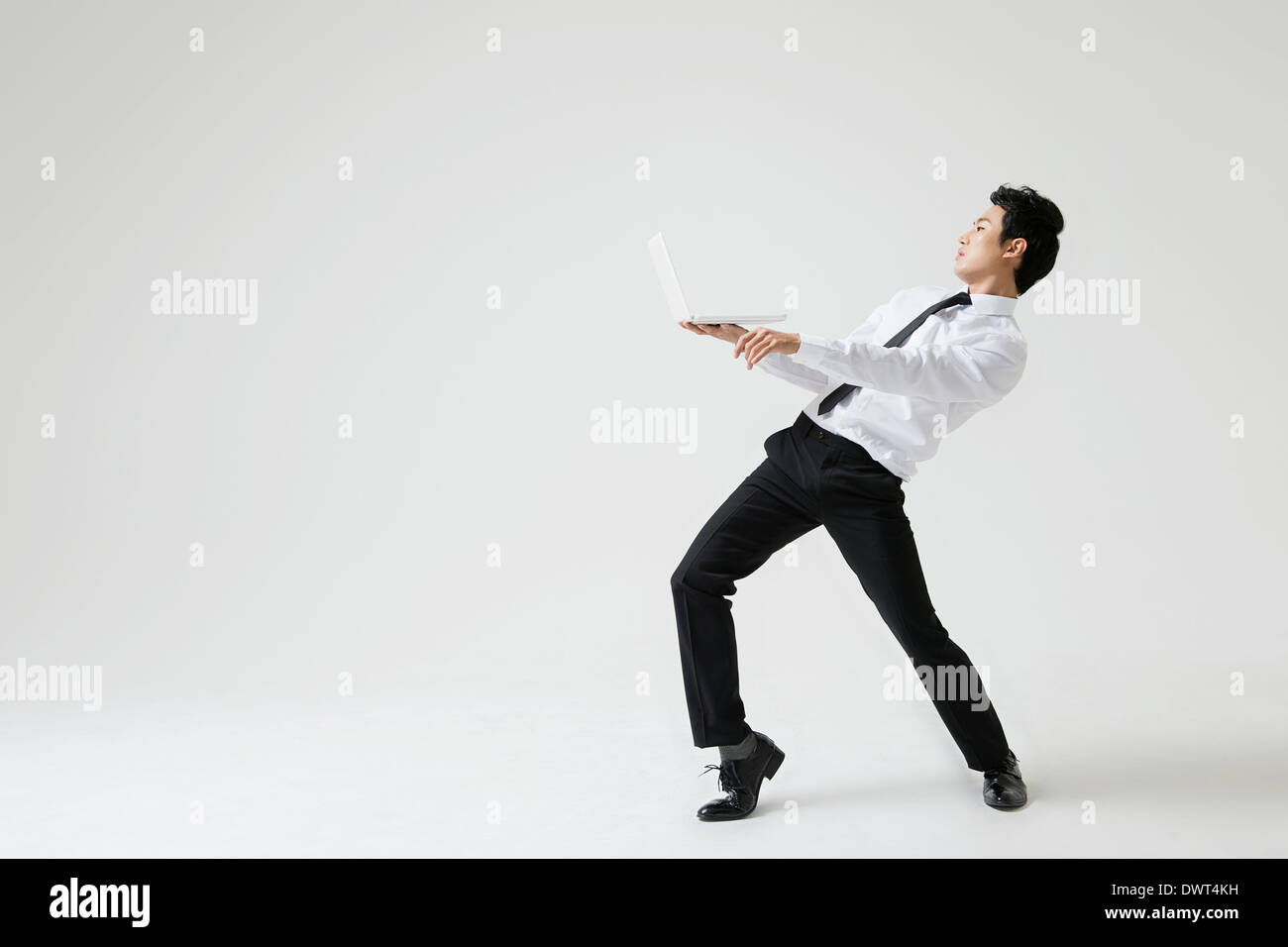 a business man making dance poses Stock Photo - Alamy