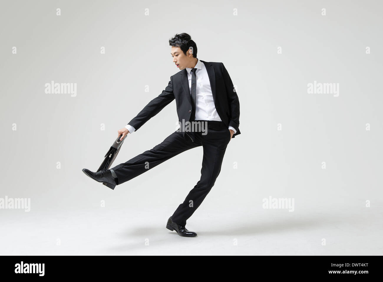 a business man making dance poses Stock Photo - Alamy