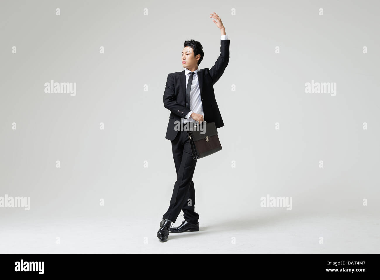 a business man making dance poses Stock Photo - Alamy