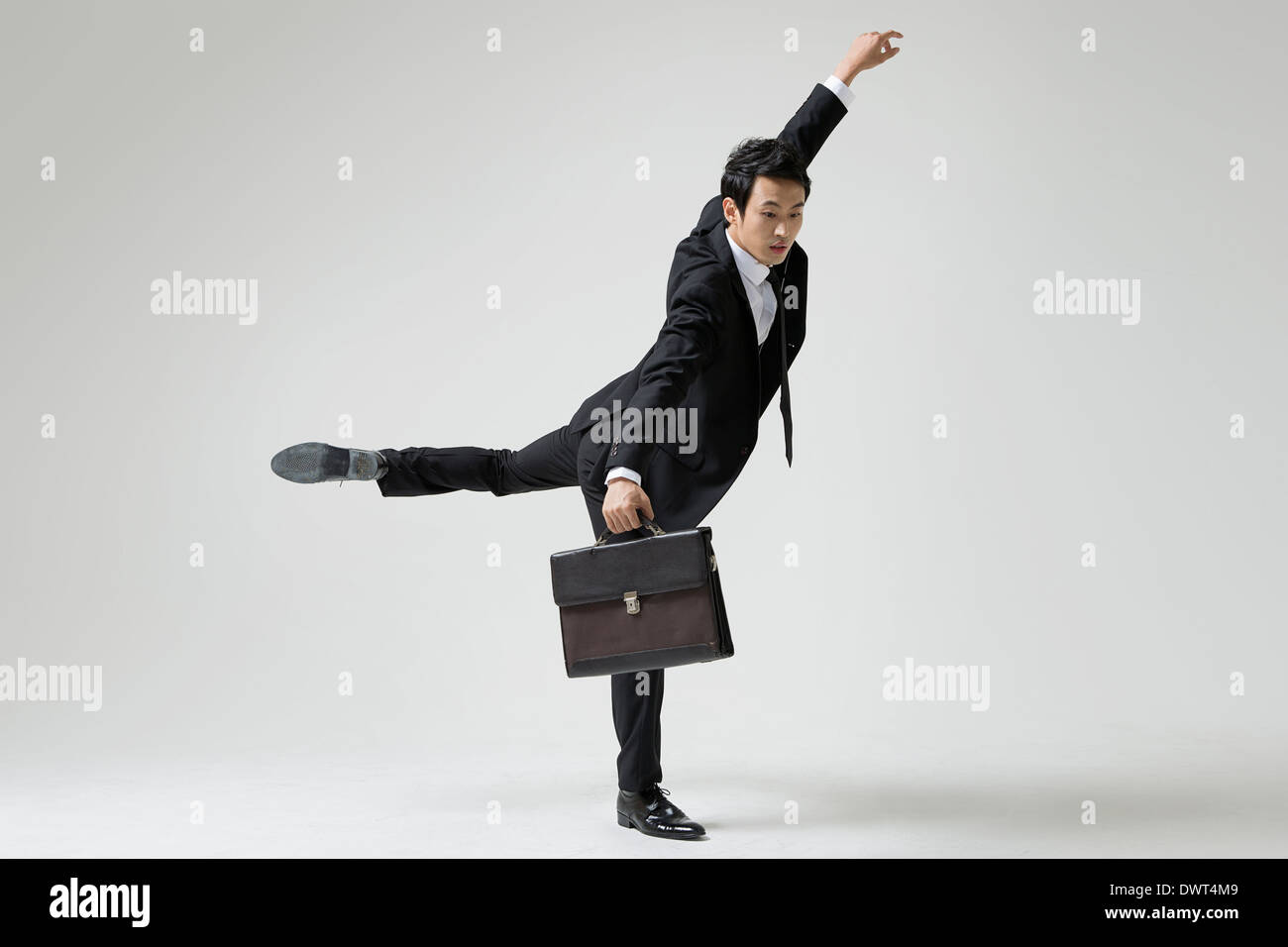 a business man making dance poses Stock Photo - Alamy
