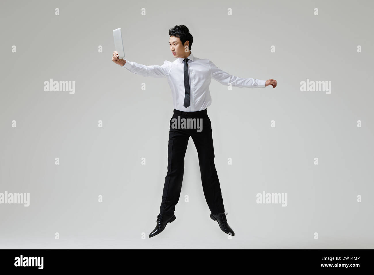 a business man making dance poses Stock Photo - Alamy