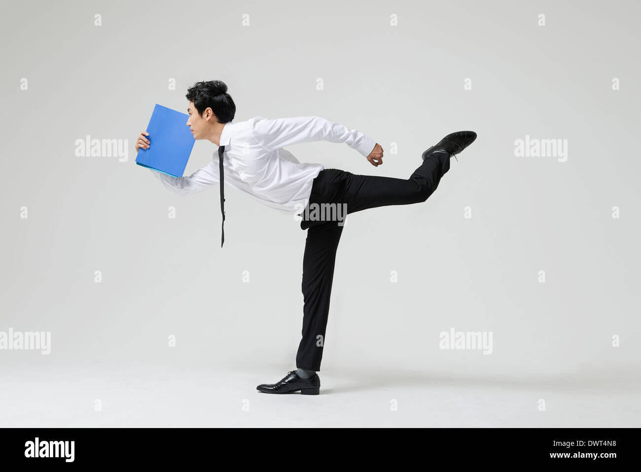 a business man making dance poses Stock Photo - Alamy