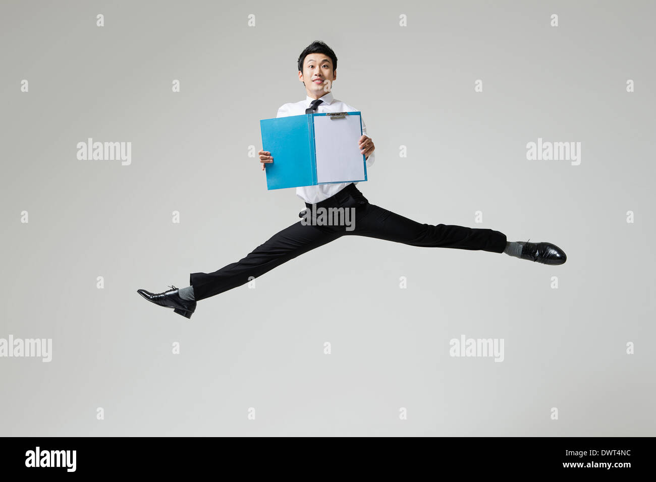 a business man making dance poses Stock Photo - Alamy