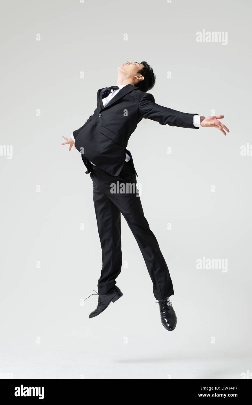 a business man making dance poses Stock Photo - Alamy