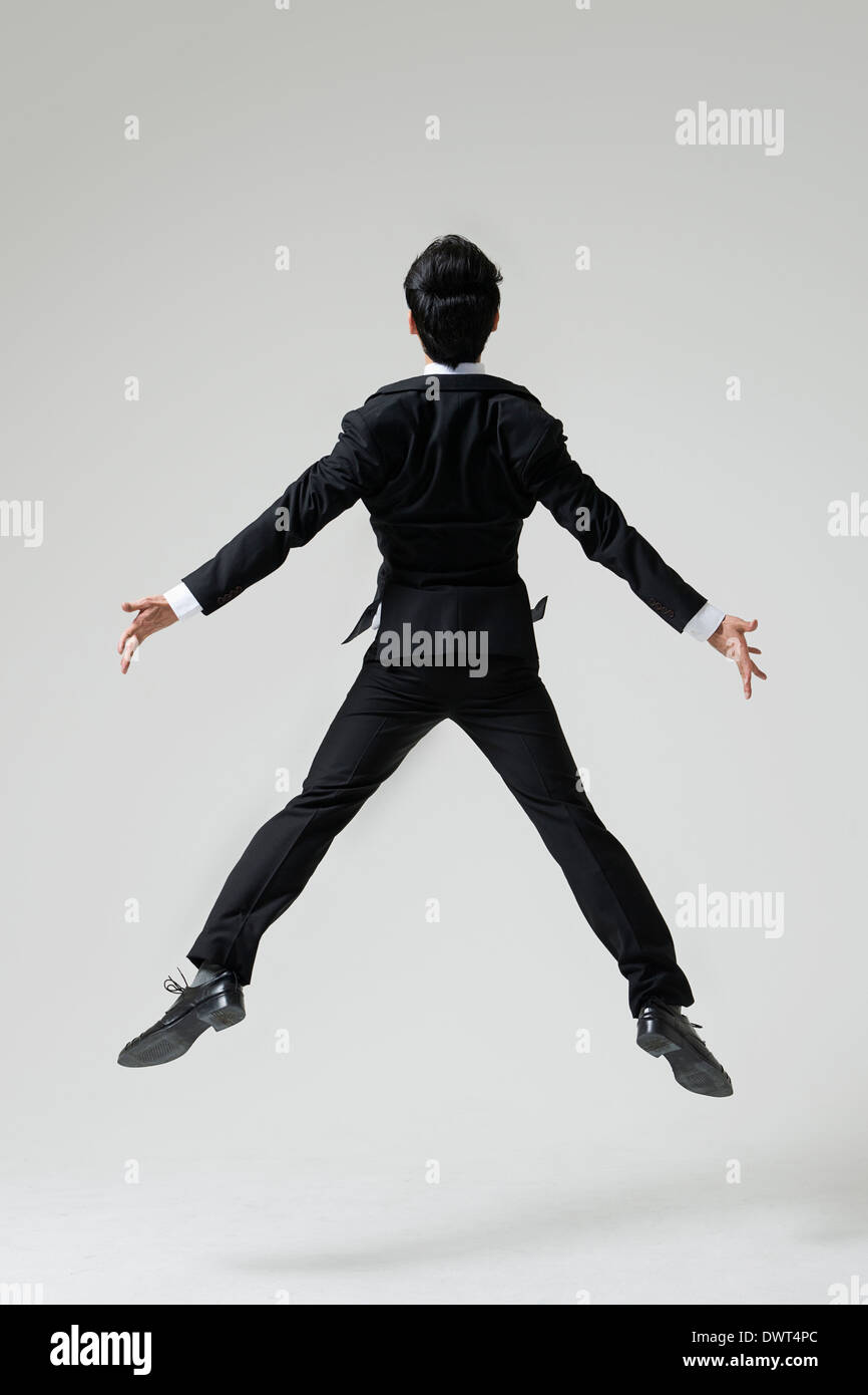 a business man making dance poses Stock Photo - Alamy