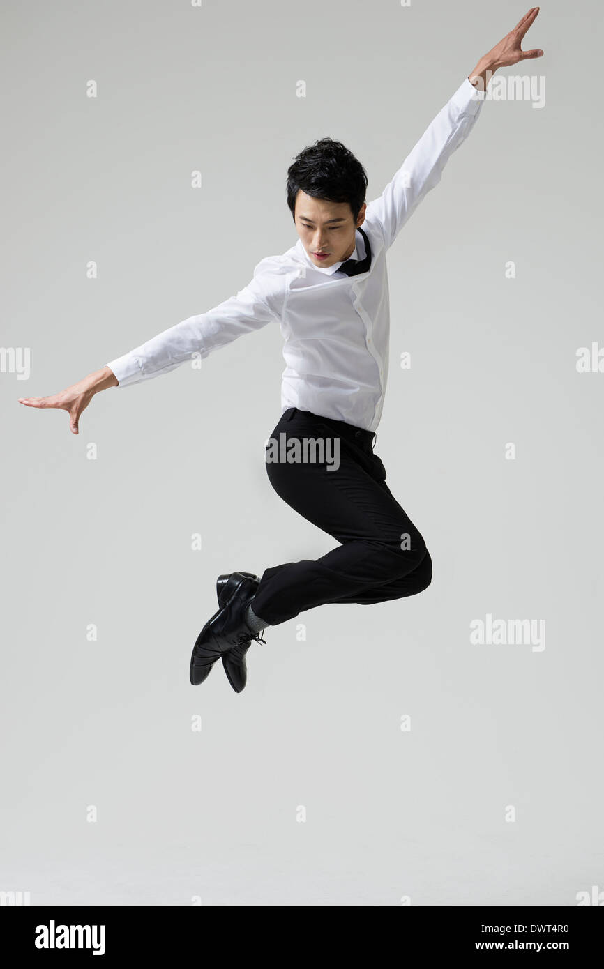 a business man making dance poses Stock Photo - Alamy