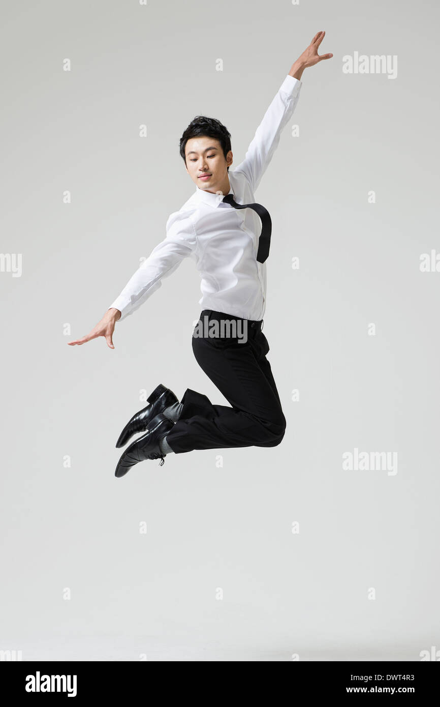 a business man making dance poses Stock Photo - Alamy