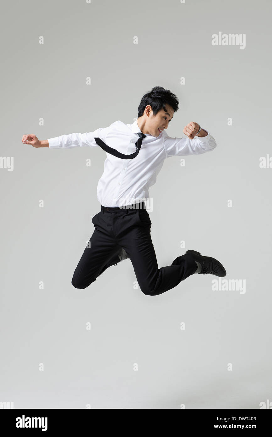 a business man making dance poses Stock Photo - Alamy