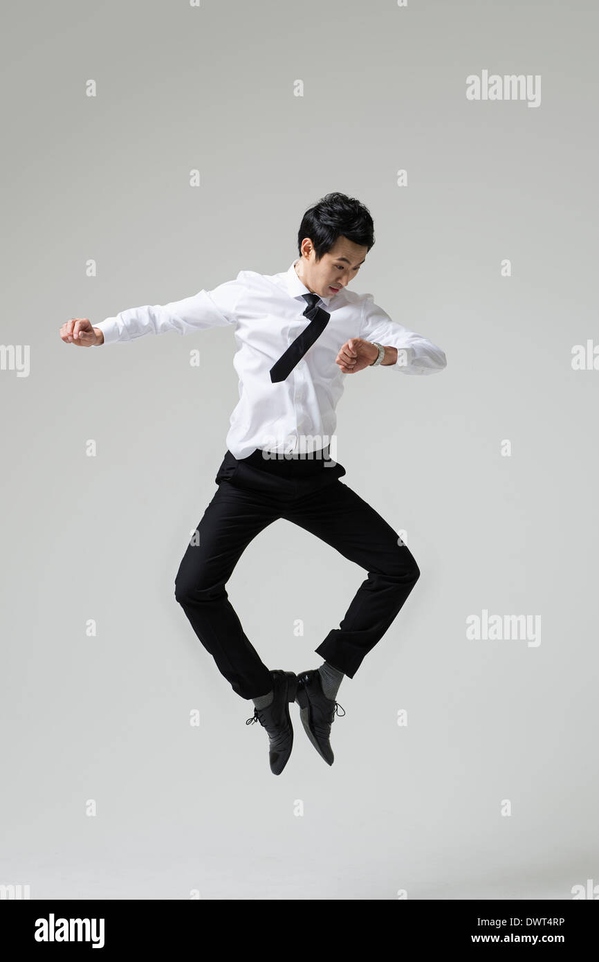 a business man making dance poses Stock Photo - Alamy