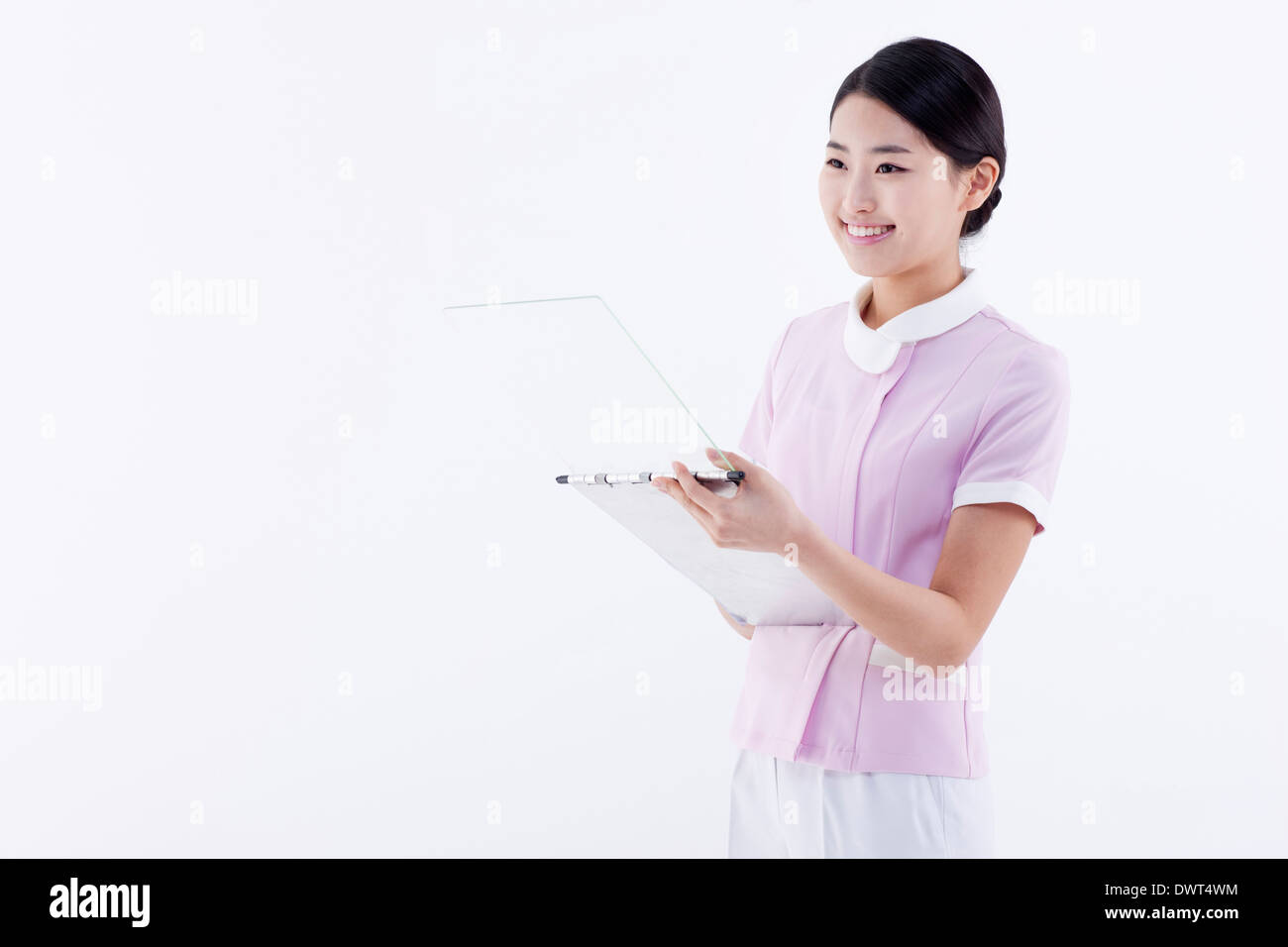 a nurse posing with a patient chart Stock Photo - Alamy