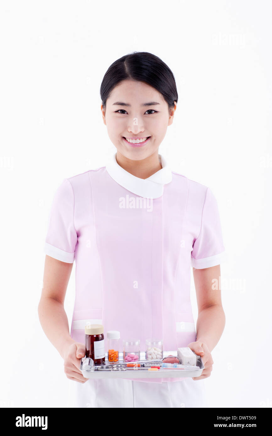 a nurse posing with medical equipment Stock Photo - Alamy