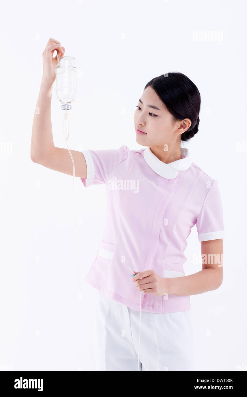 a nurse posing with medical equipment Stock Photo - Alamy